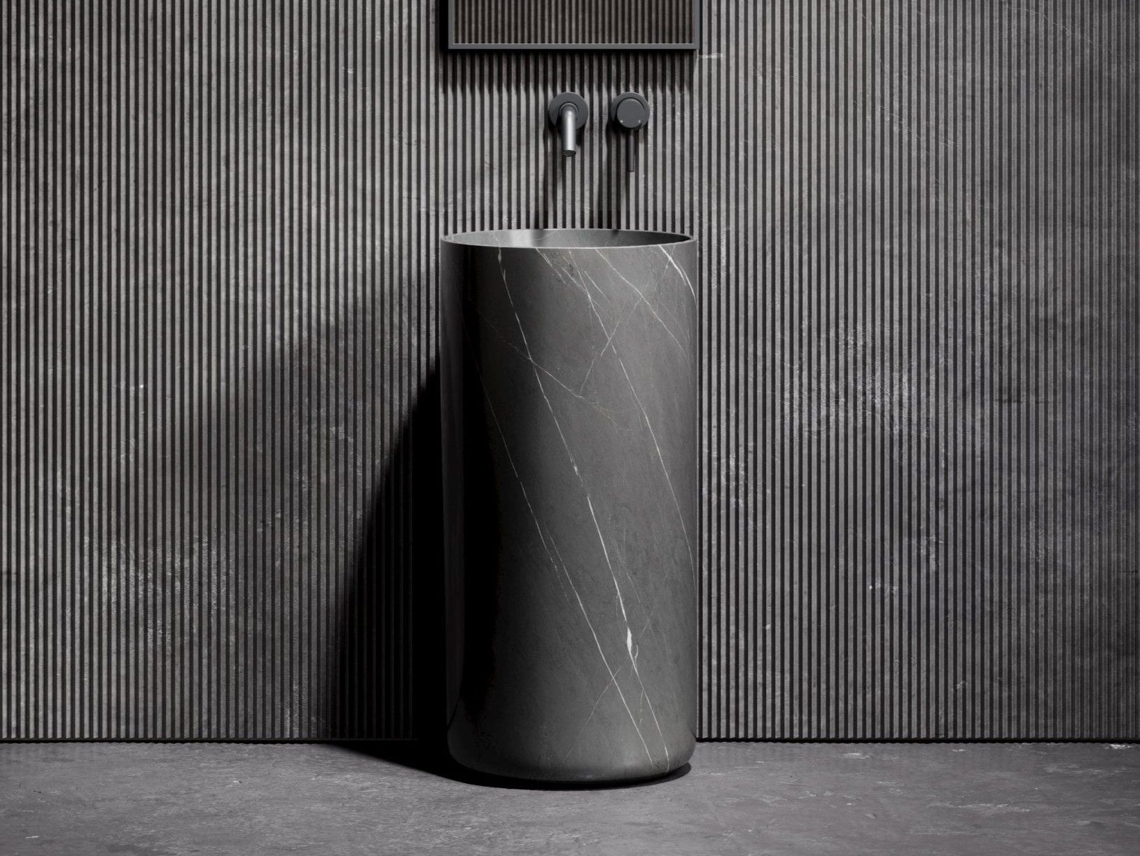 DESIGNO Freestanding round Pietra Grey marble washbasin By LUSSO
