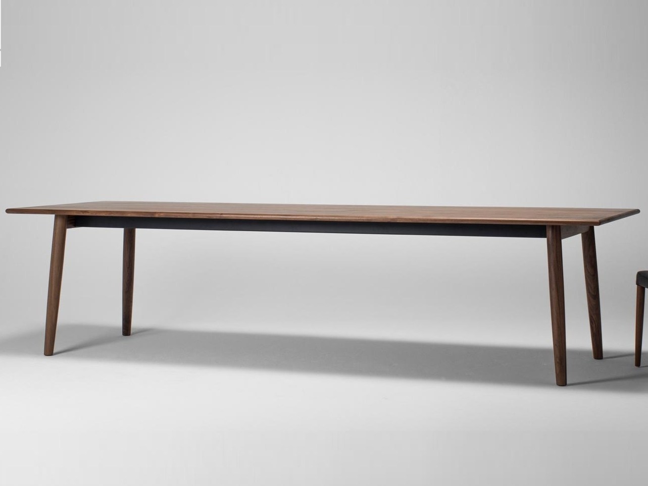 MCM Extending walnut dining table By Ritzwell | design Shinsaku Miyamoto