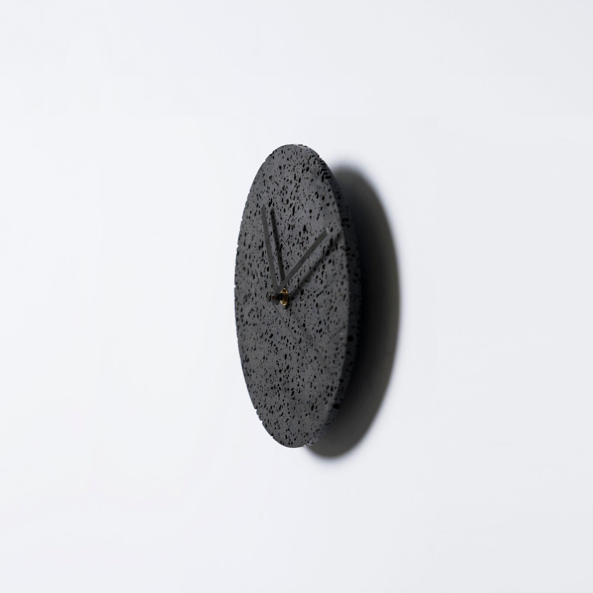 MOMENT | Wall-mounted clock Wall-mounted lava stone clock By BUZAO
