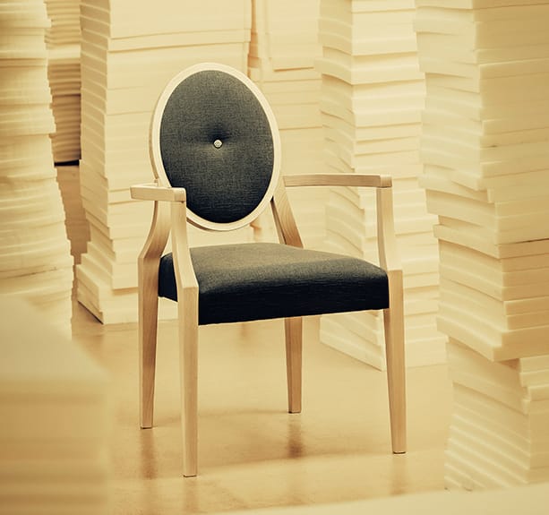 MONOLISA Stackable fabric chair with armrests By More Contract