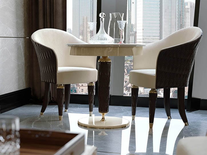 NUMERO TRE Leather easy chair with armrests By Turri