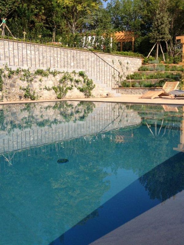 Infinity swimming pool Infinity swimming pool with waterfall By INDALO ...